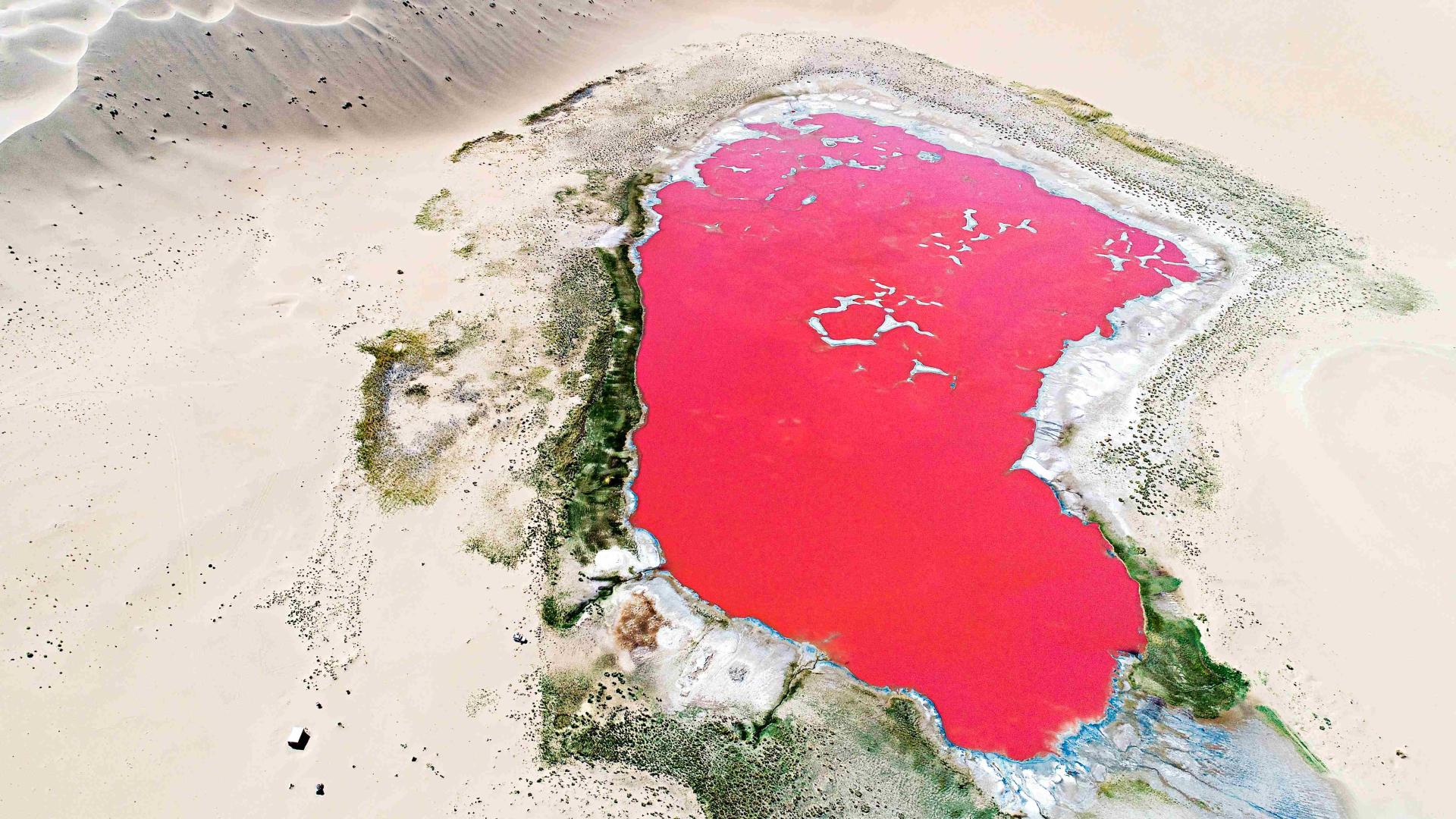 The ruby lake hidden in the desert in north China - CGTN