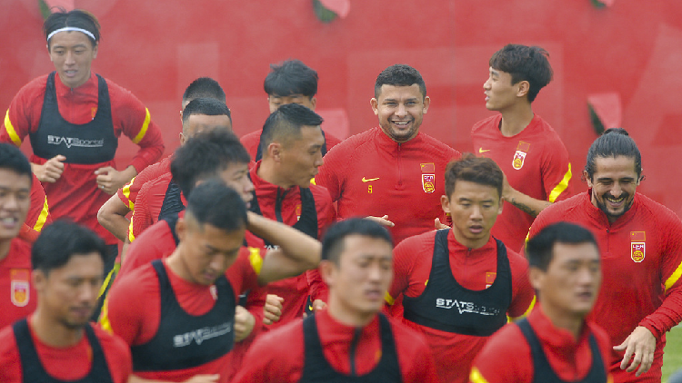 Chinese men's national football team train for next warm-up game - CGTN