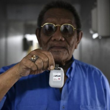 Singapore hands out COVID-19 contact tracing devices to seniors - CGTN