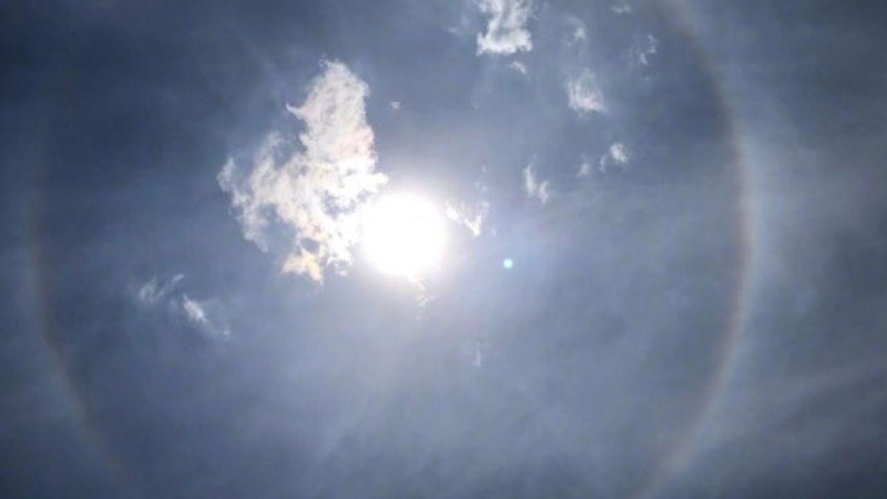 Rare spectacle in the sky: Aureole and rainbow spotted together - CGTN