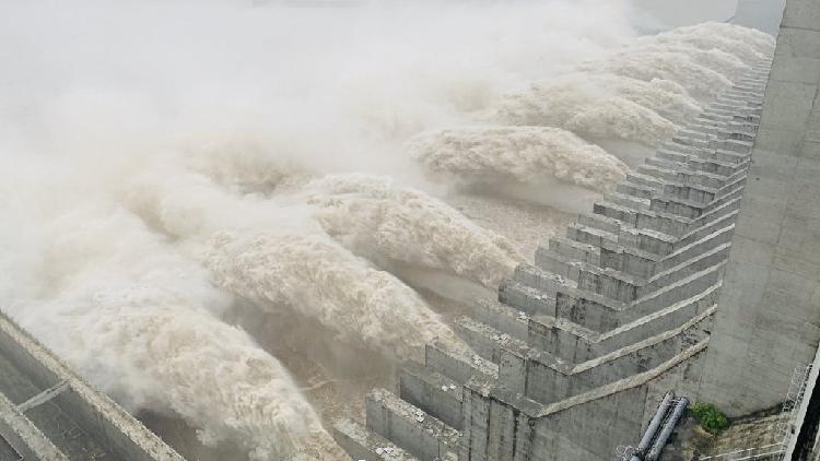 World's largest hydroelectric dam ushers in largest flood peak - CGTN