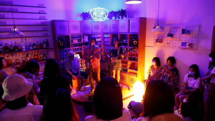 Shed masks and party again: China moves on from COVID-19 - CGTN