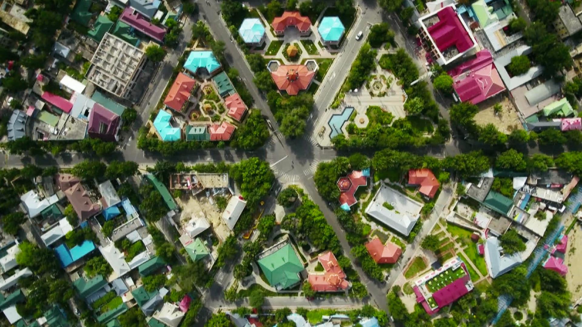 Aerial Footage: Explore the colorful Liuxing Street in Yining City - CGTN