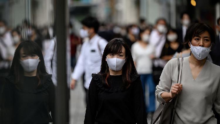 Japan to remove travel ban for 12 countries including China: media - CGTN