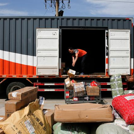China's courier sector business volume jumps over 50 % during holiday ...