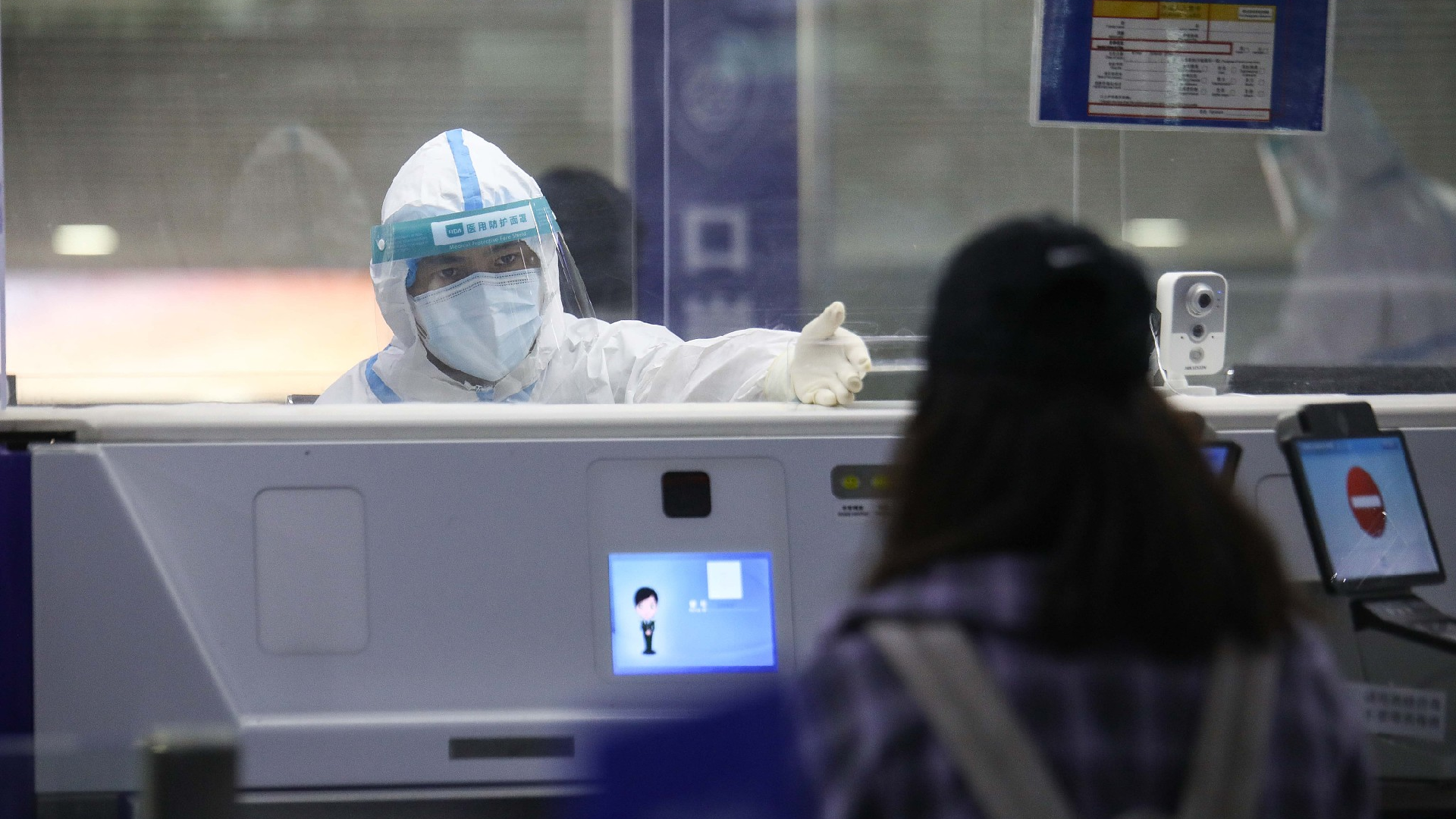 China: All travelers from Singapore must obtain green health codes - CGTN