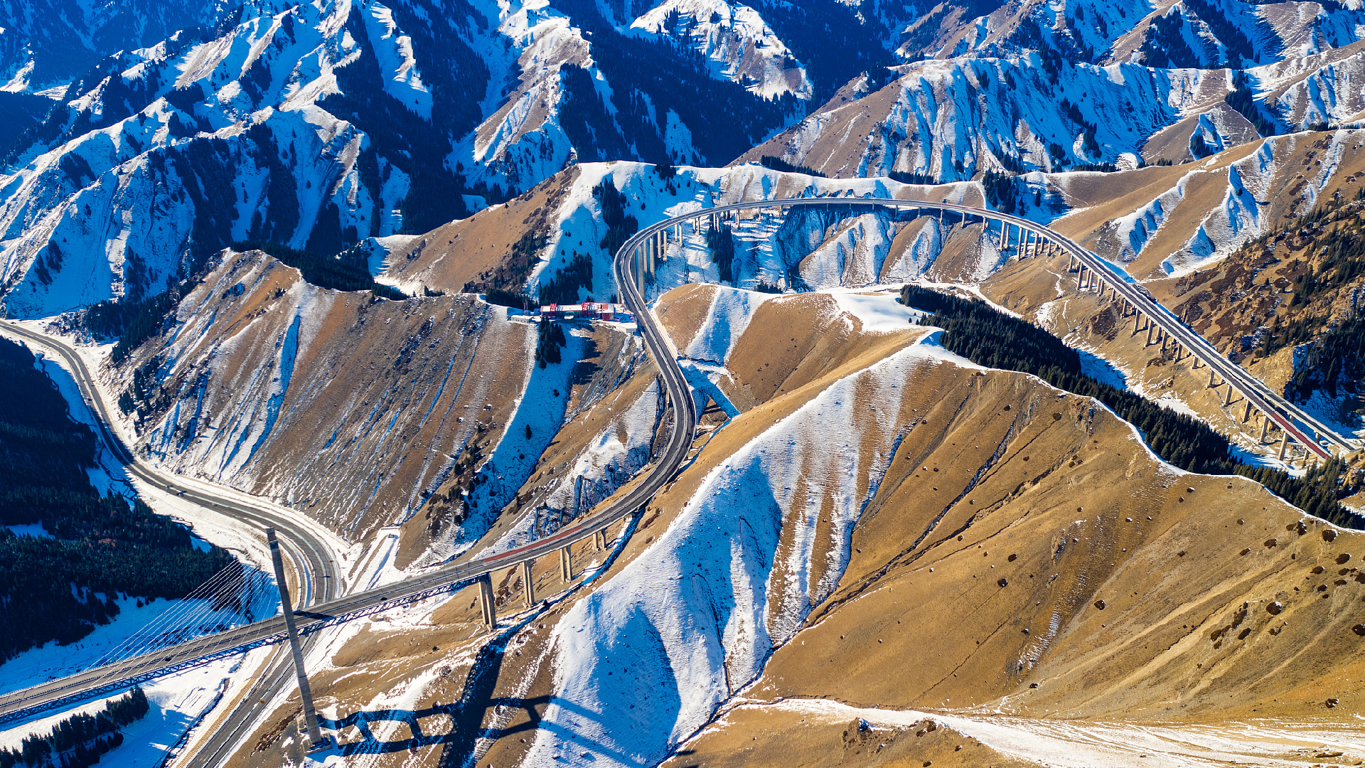 An aerial view of ‘wild fruit’ valley in winter - CGTN