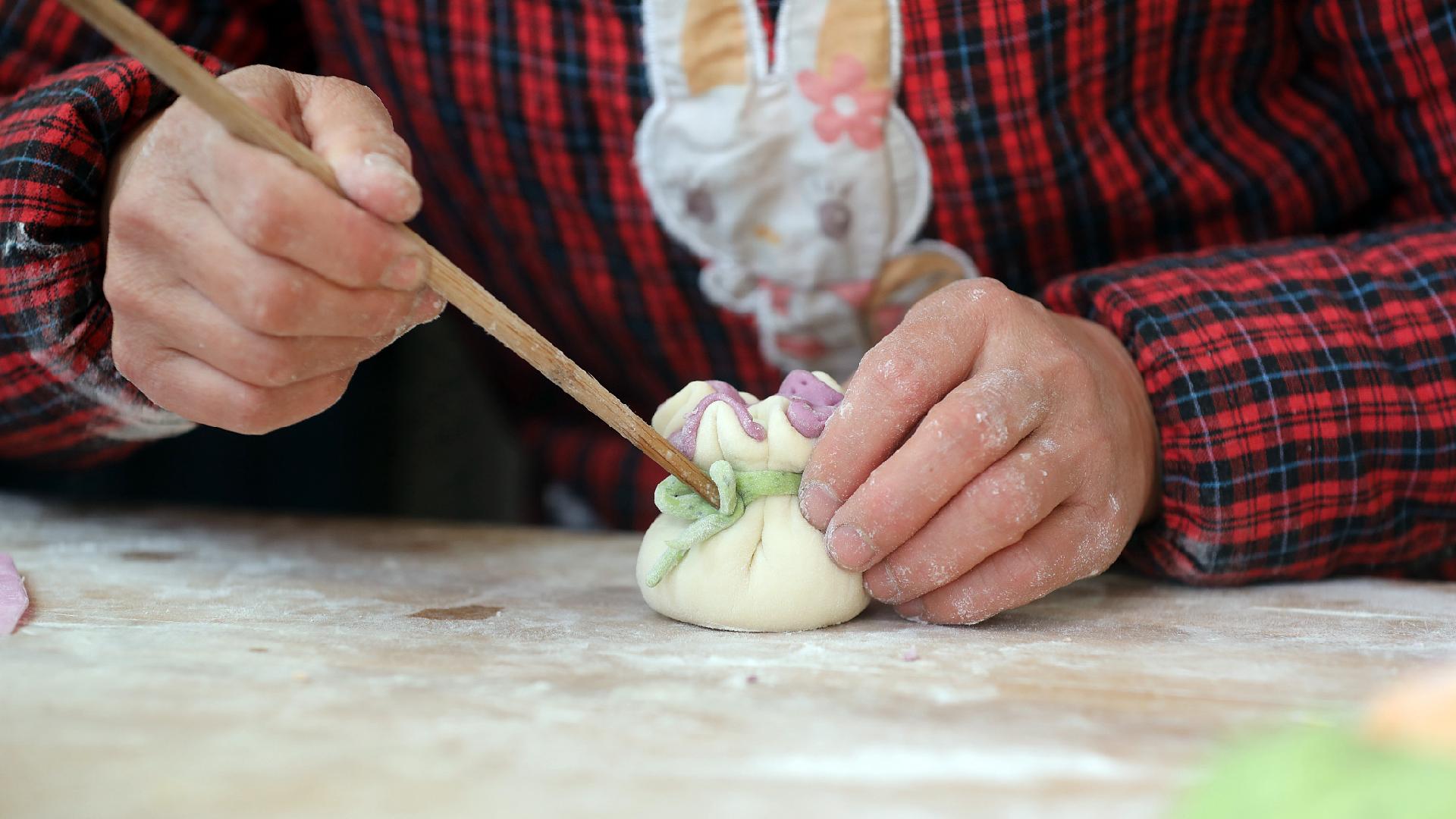 Chinese villagers make animal-shaped buns to celebrate Spring Festival ...