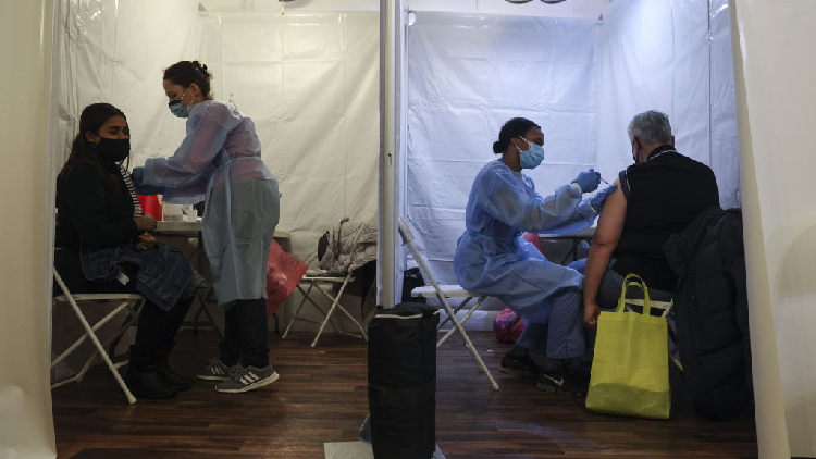 Vaccine rollout shows wealth means health in the U.S. - CGTN