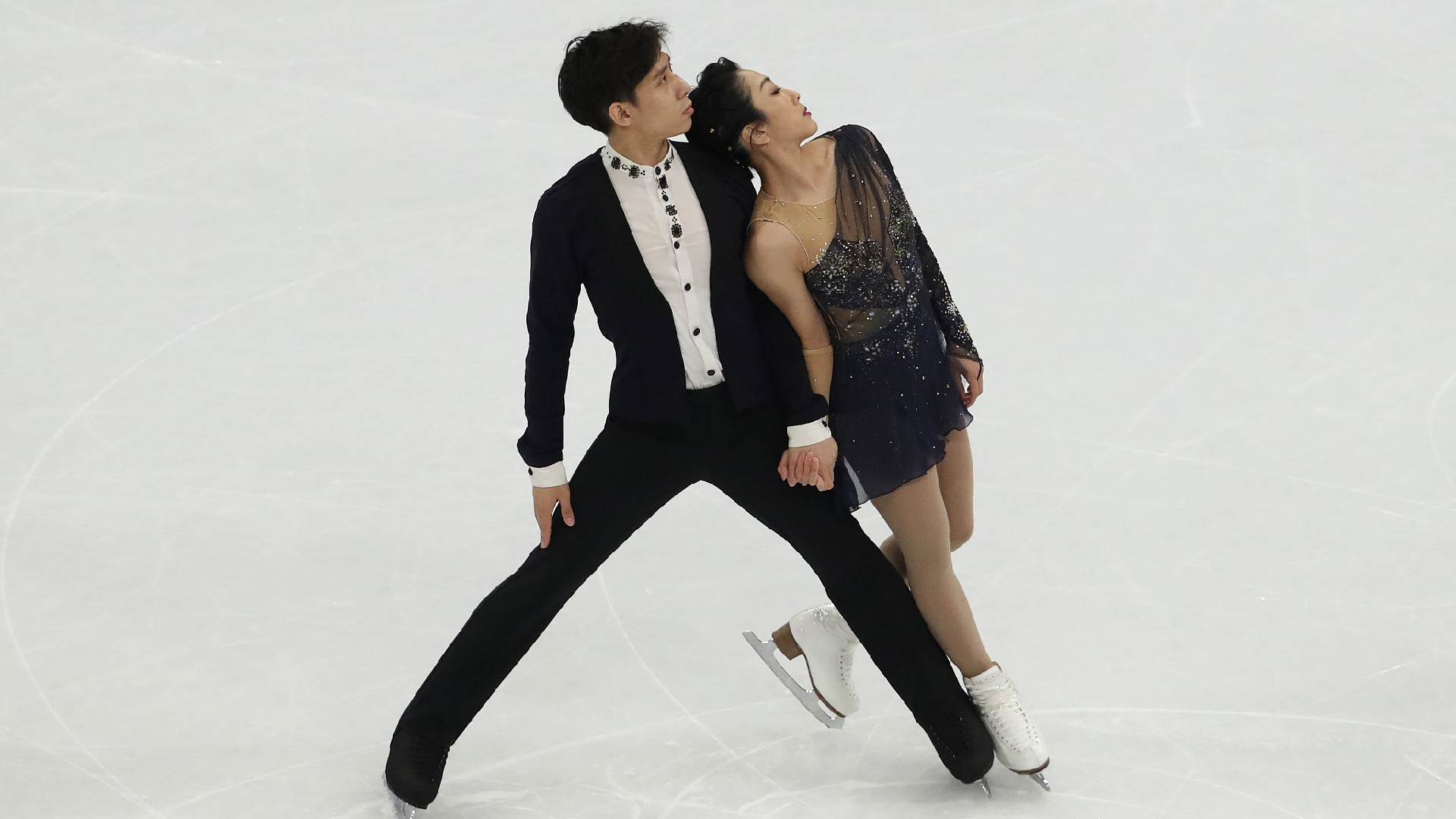 China's Sui, Han finish second in short program at world championships ...