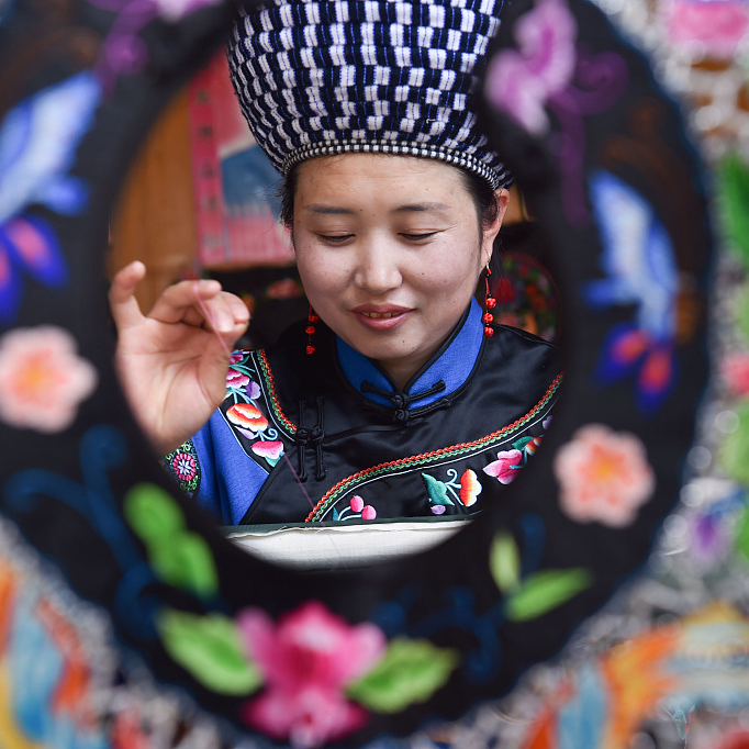 Miao women hand down embroidery skills from generation to generation - CGTN