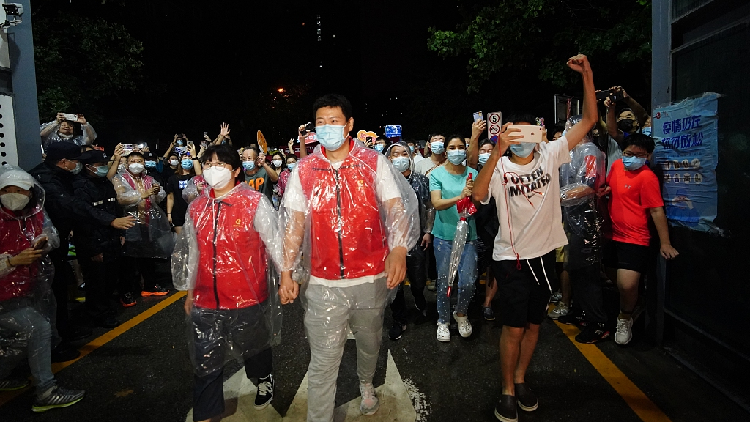 Last two communities under lockdown in Beijing reopen - CGTN