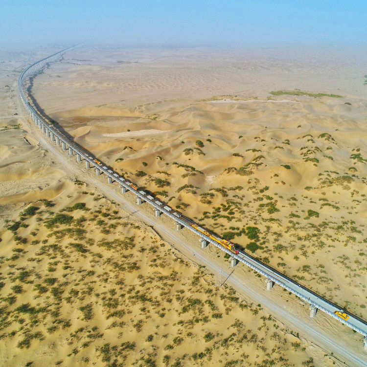 Live: World's first railway loop line circling a desert completed - CGTN