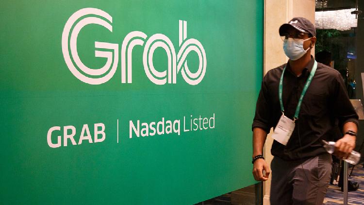 Grab slumps in U.S. debut after record SPAC deal - CGTN