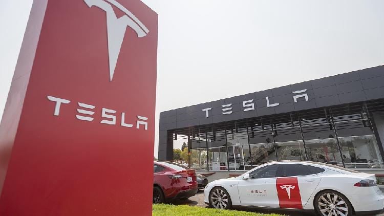 Tesla delivered almost 1 million cars globally in 2021 - CGTN