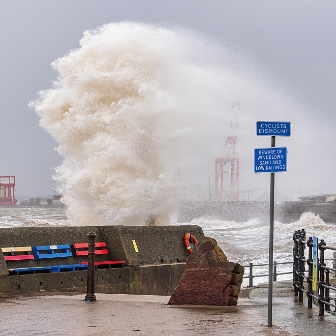 In pictures: Storm Eunice blows off rooftops and topples the trees - CGTN