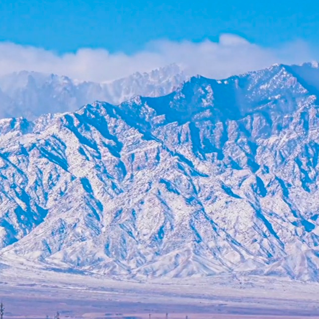 Breathtaking view of snow-covered Helan Mountains in NW China - CGTN