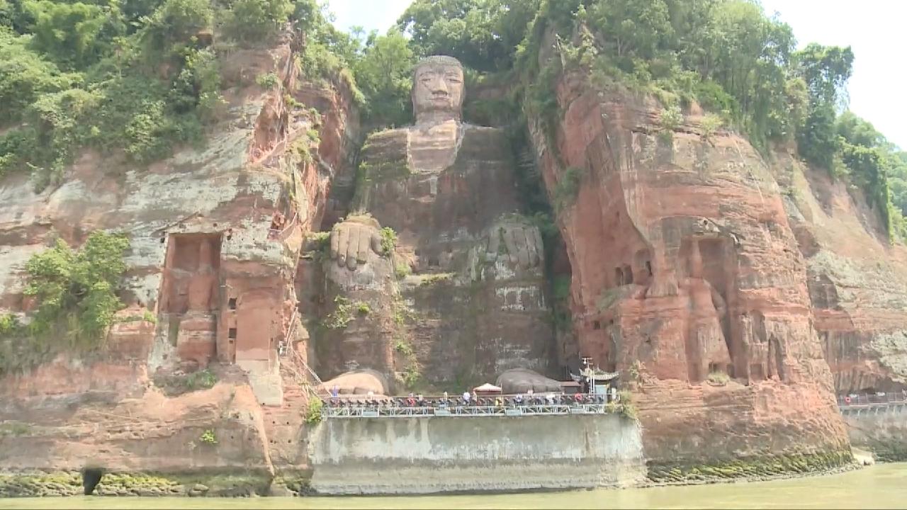 Low water level shows all of world's largest stone Buddha statue - CGTN