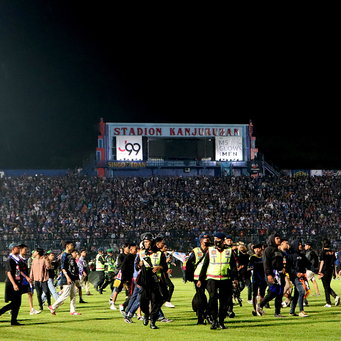 Death toll from Indonesian football stampede revised down to 125 - CGTN