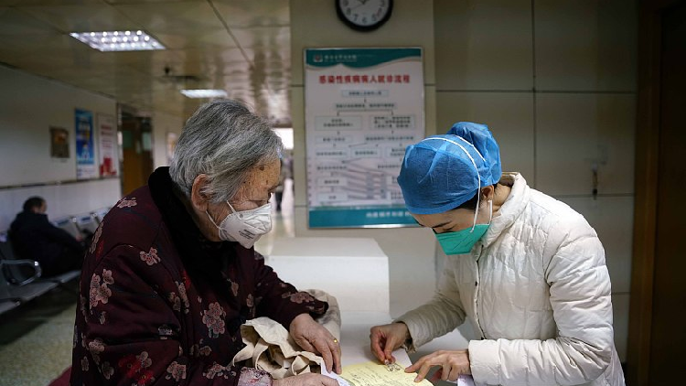China adjusts medical insurance to ease COVID-19 patients' pockets - CGTN