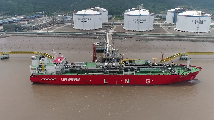 World's largest LNG refueling vessel completes loading in China - CGTN