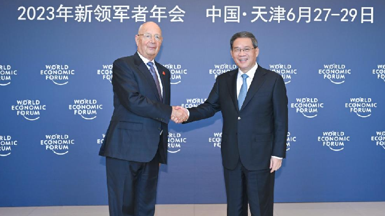 Premier Li tells WEF chief: China committed to high-level opening up - CGTN