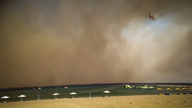 Rhodes wildfire forces thousands of evacuations, tourists flee - CGTN