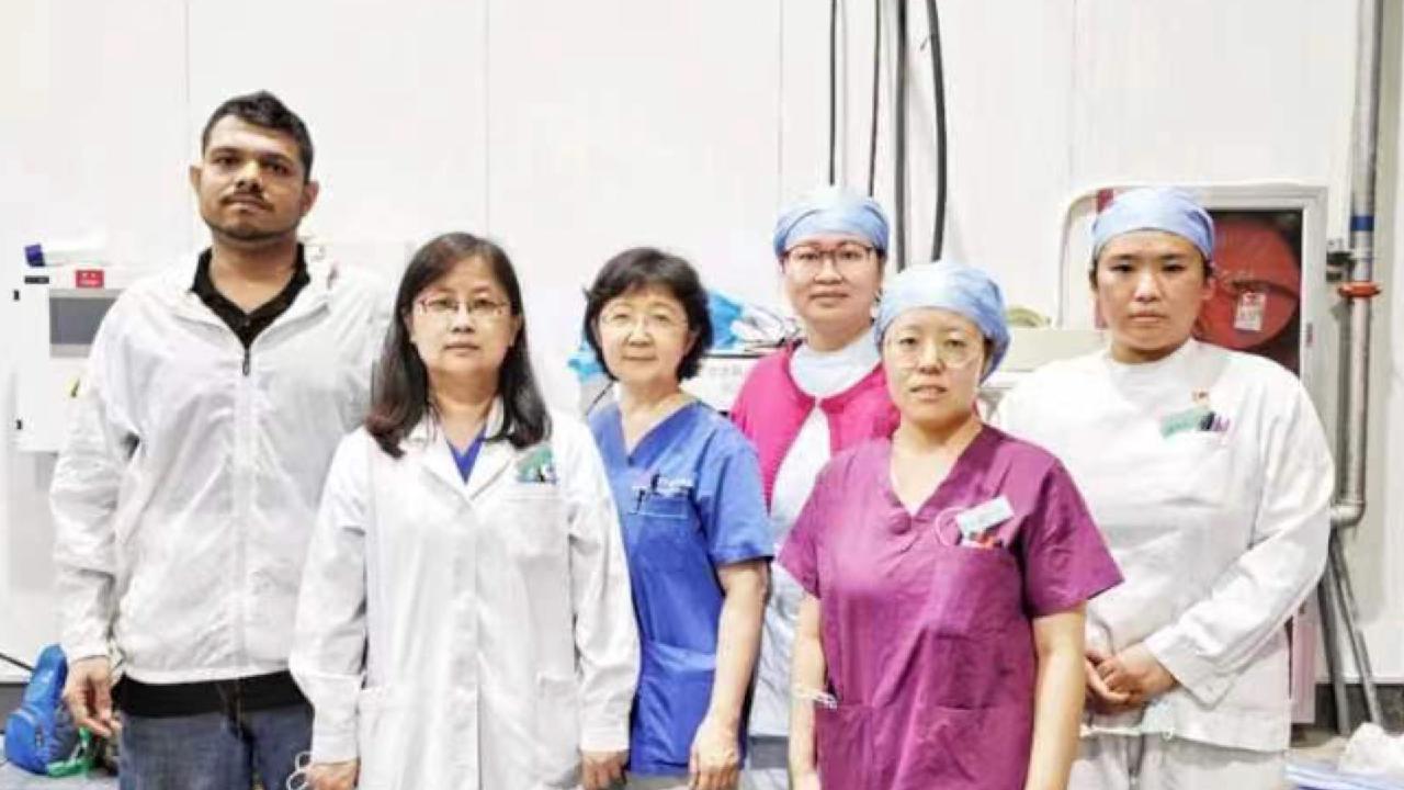 Pediatrician from Bangladesh witnesses heavy rainfall in Beijing - CGTN