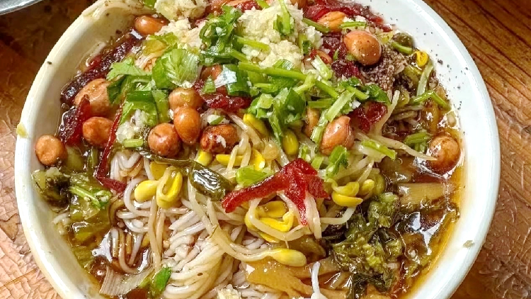 Historical Hainan rice noodle tempts foodies' taste buds - CGTN