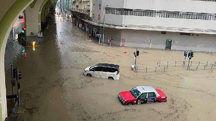 Hong Kong SAR fights flooding after typhoon brings heavy rainfall - CGTN