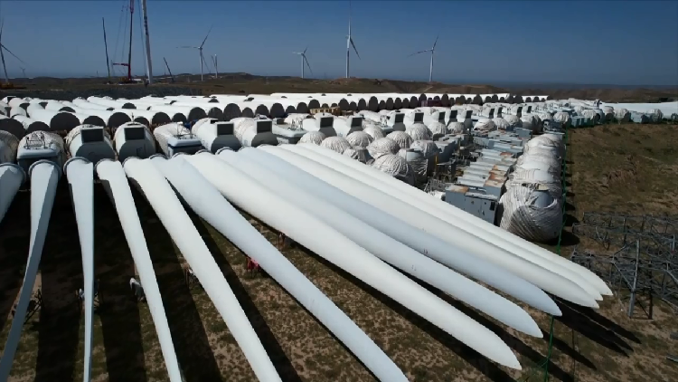 Going green: How retired wind turbine blades are recycled and reused - CGTN