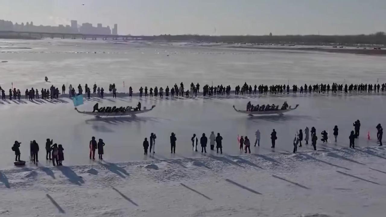 Teams from China's north, south meet in Harbin's ice dragon boat race ...