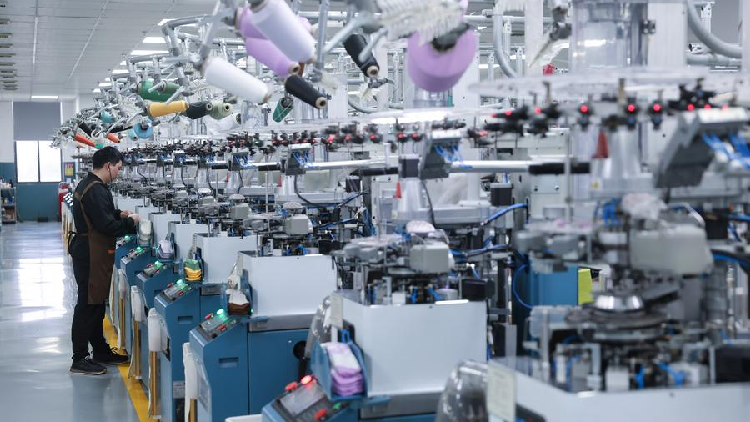 China's manufacturing activity expands in March, official PMI shows - CGTN