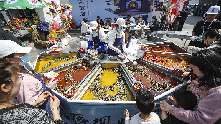 Locally renowned river snails attract thousands of visitors - CGTN