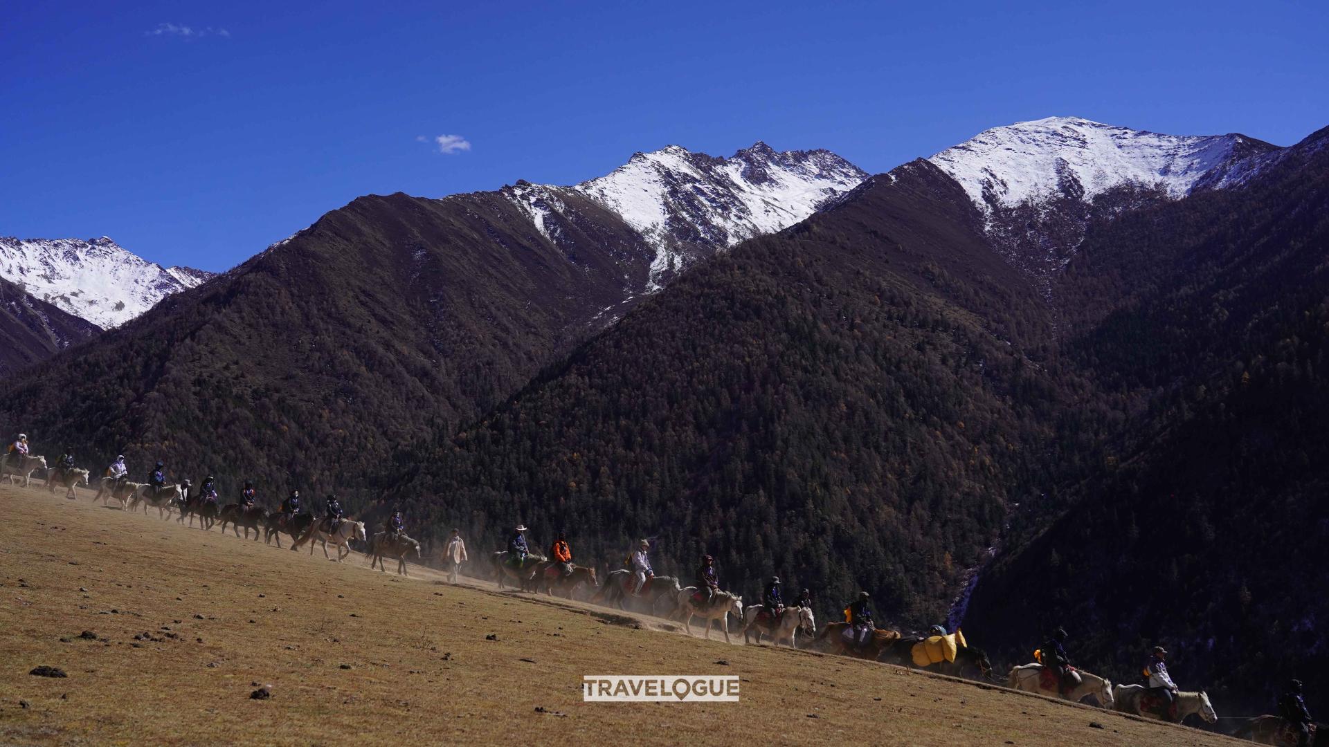 Explore Mount Siguniang's snowy peaks - CGTN