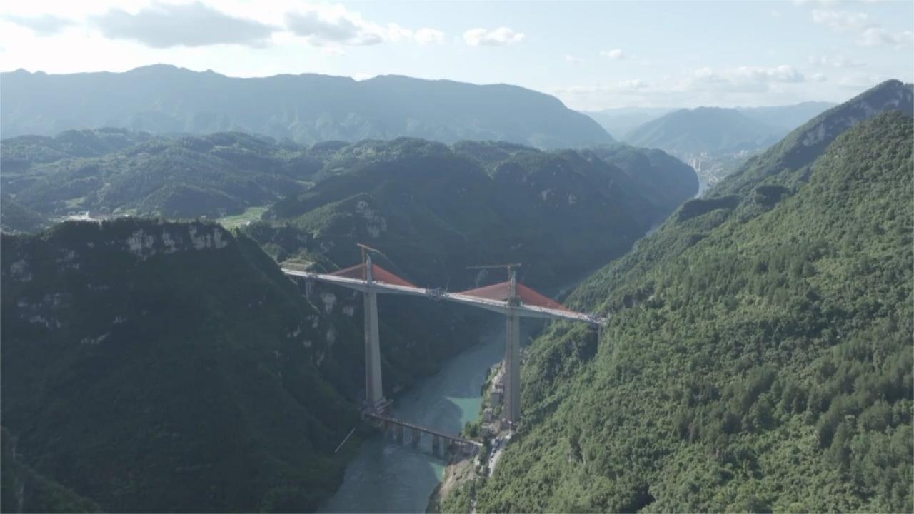 Construction of key river bridge in SW China complete - CGTN