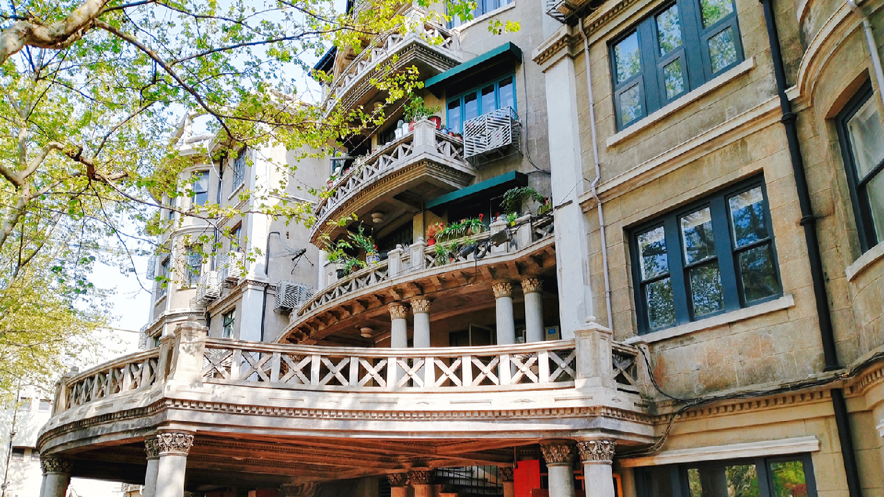 Century-old apartment building revitalized as hip cultural hub - CGTN