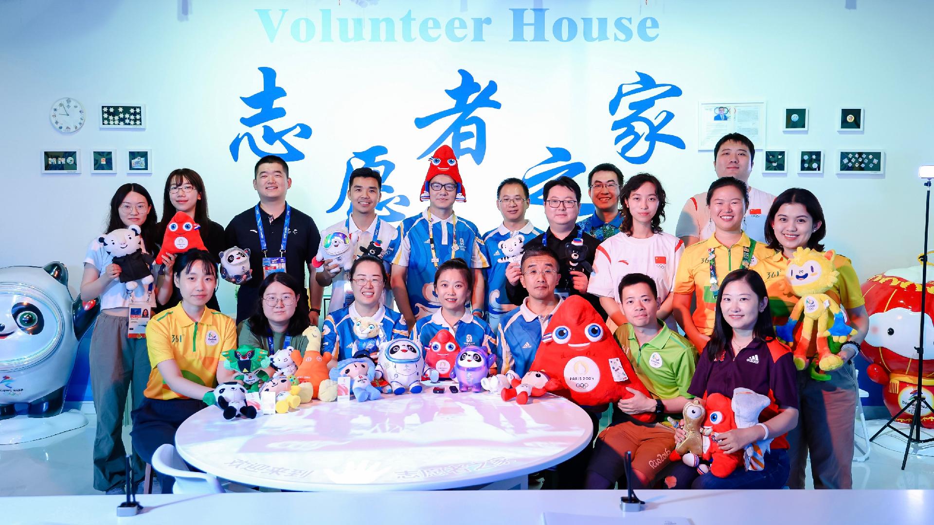 Volunteers of past Olympic Games reunite on International Olympic Day ...