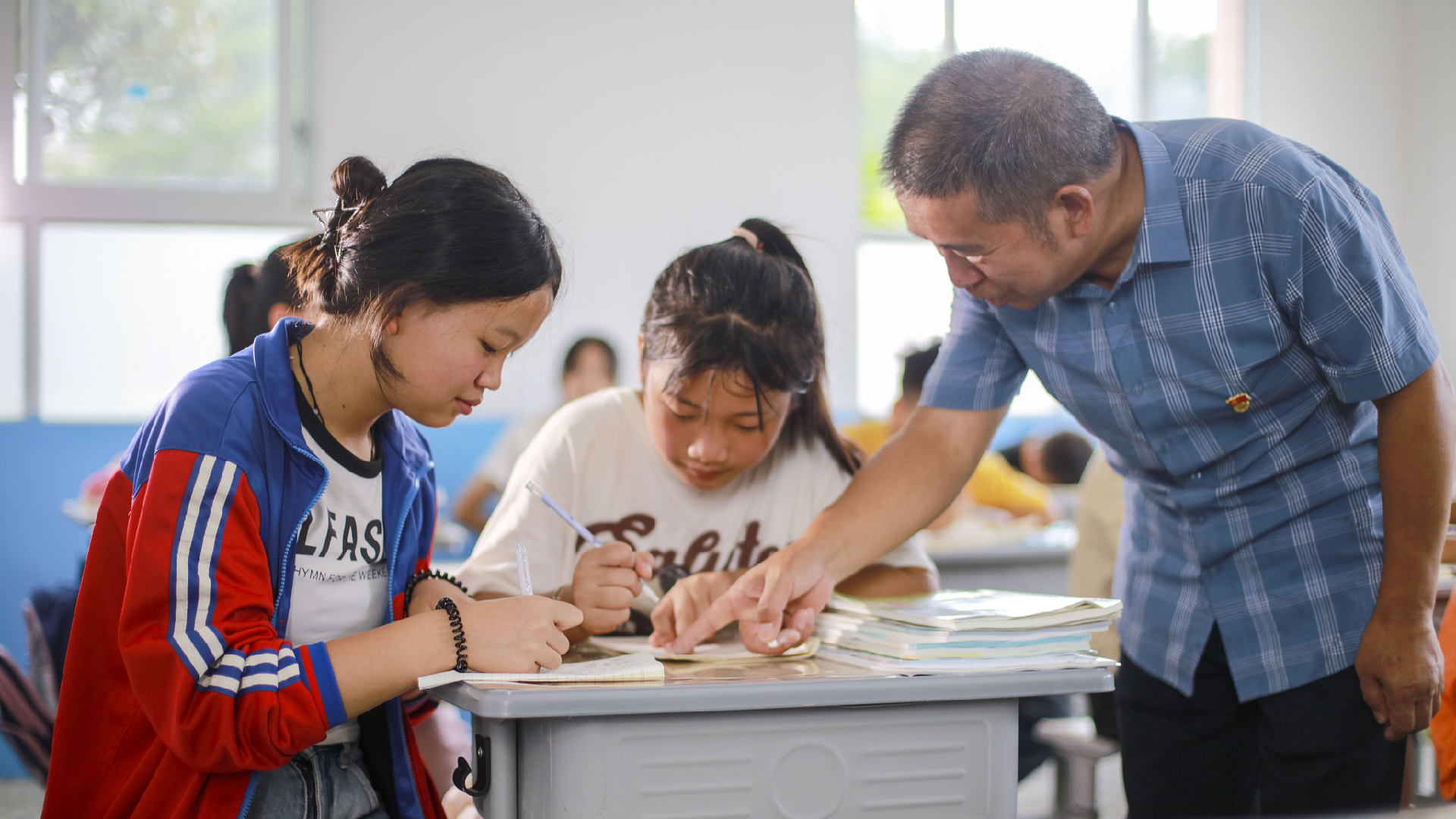 Lighting the torch of teaching: paving China's way to strong education ...