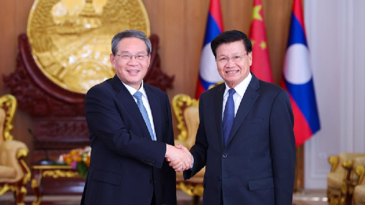 Li Qiang calls on China, Laos to enhance practical cooperation - CGTN