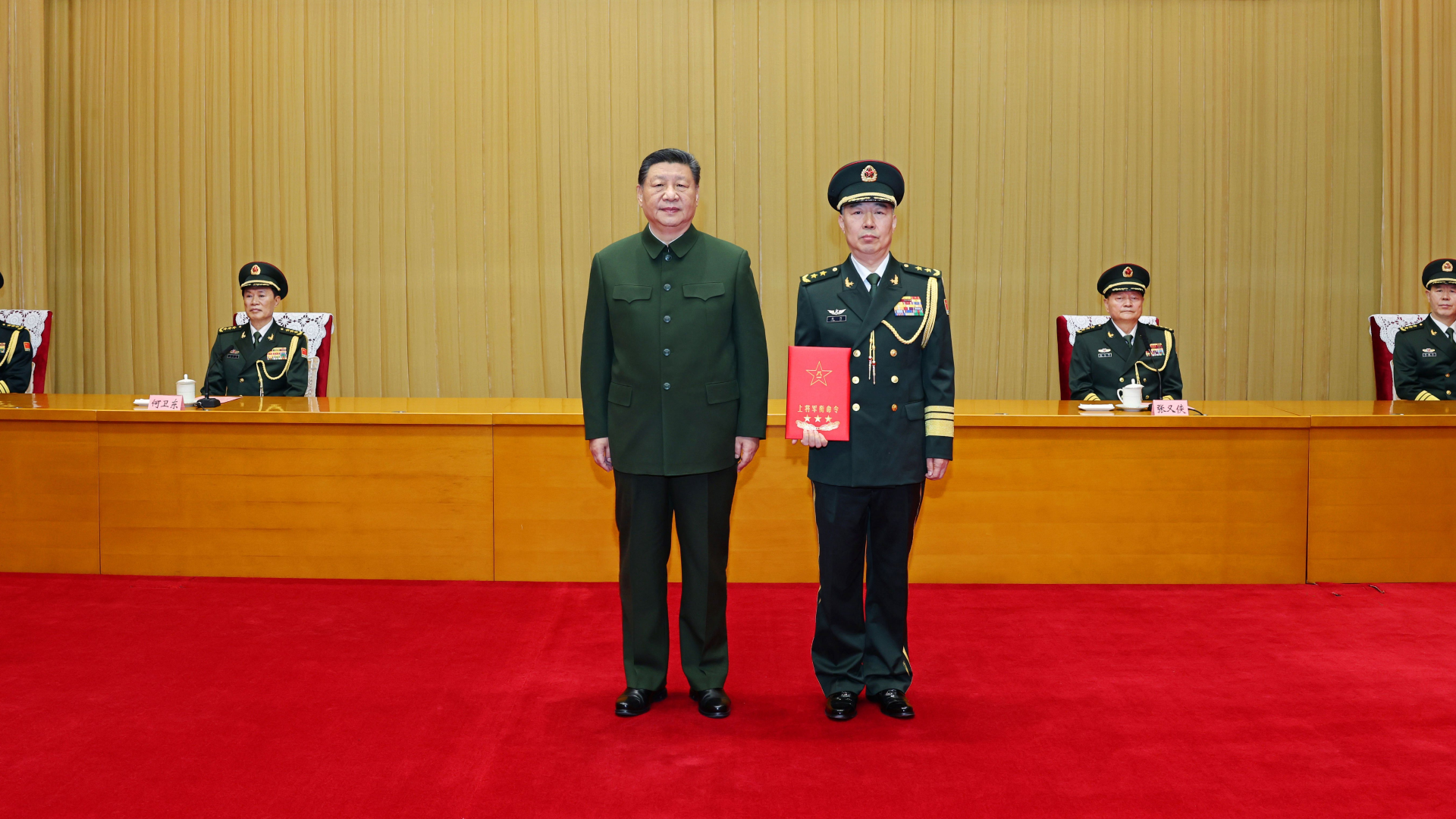 Xi presents order to promote military officer to rank of general ...