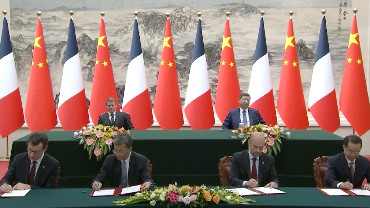 Xi, Macron attend signing ceremony of cooperation documents - CGTN