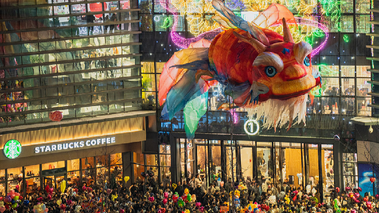 Floating Aoyu fish lantern illuminates New Year celebrations - CGTN