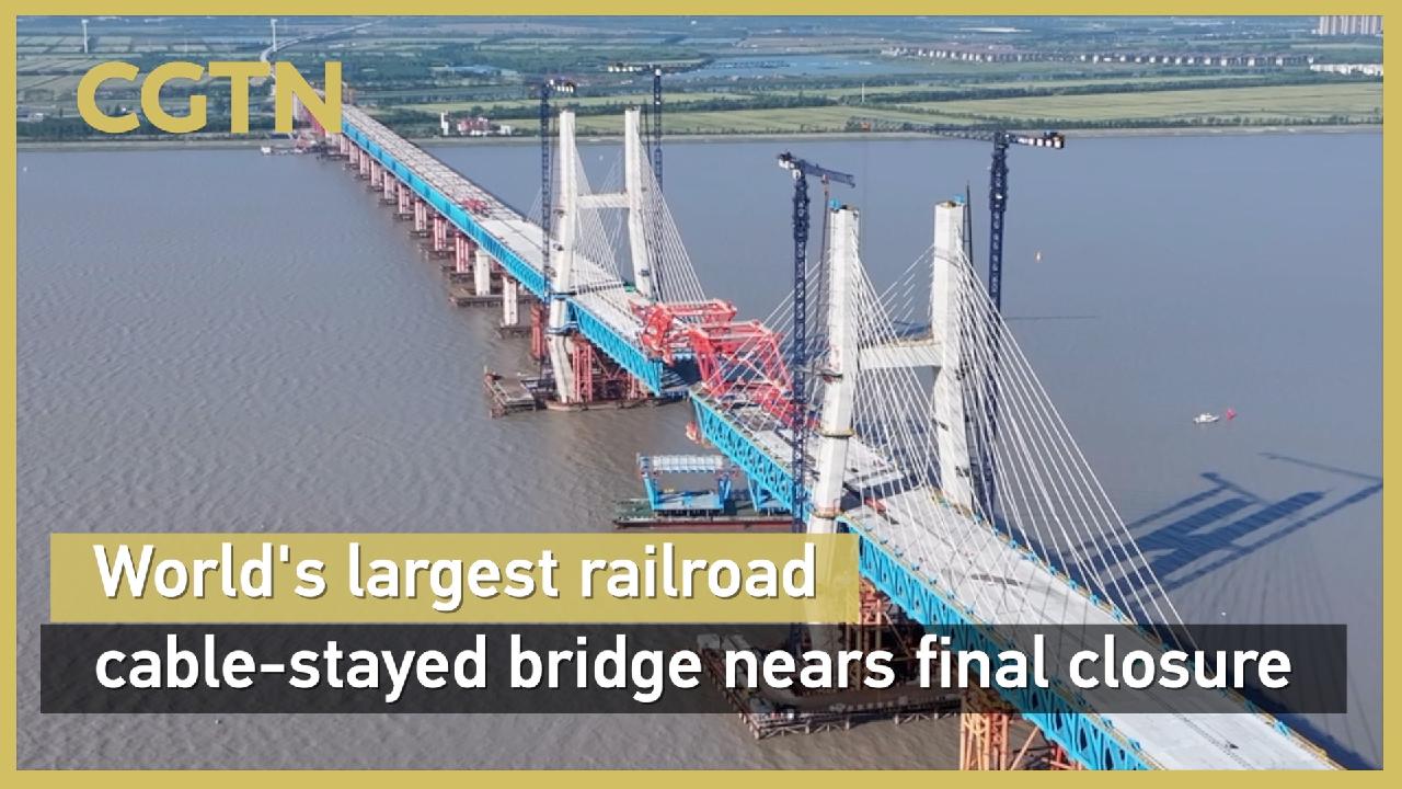 World's largest railroad cable-stayed bridge nears final closure - CGTN