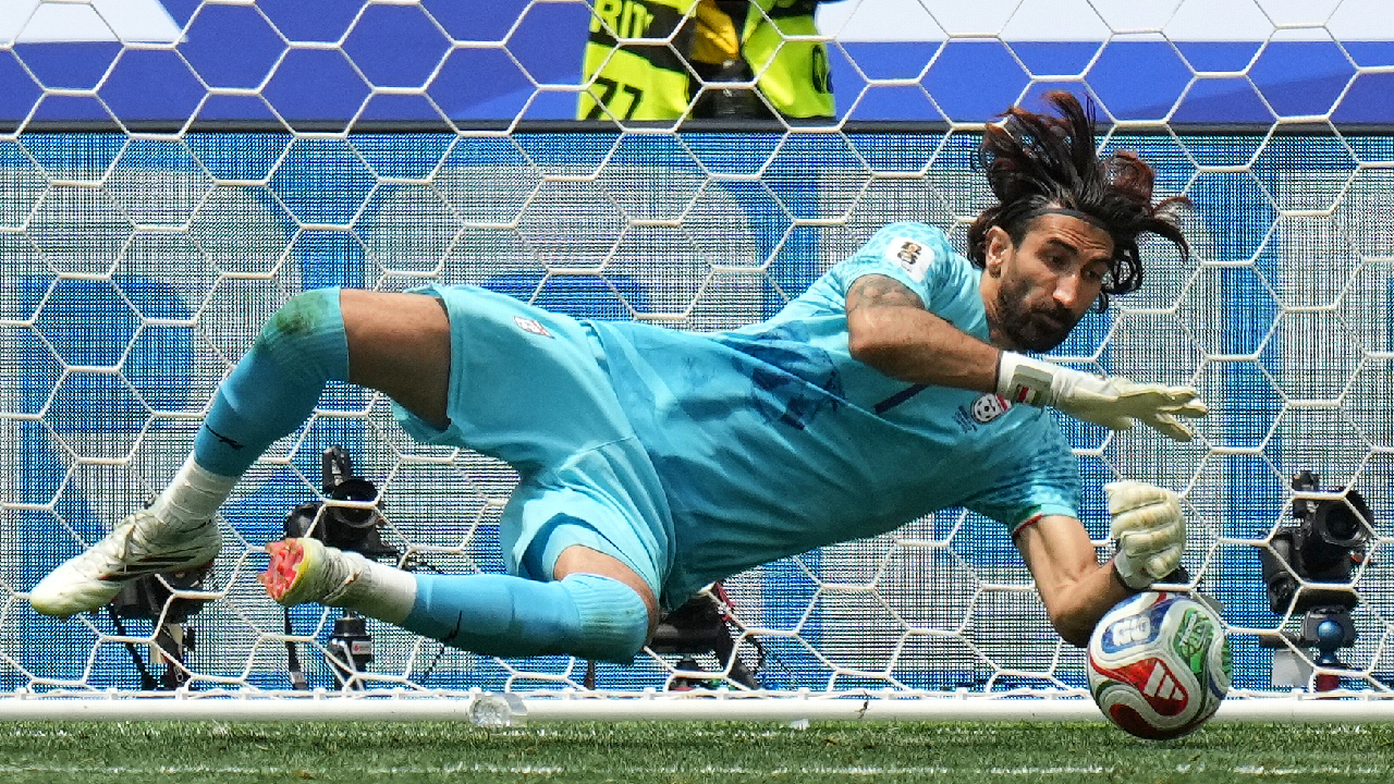 Beiranvand's seven saves help Iran battle to draw with 10-man Belgium ...