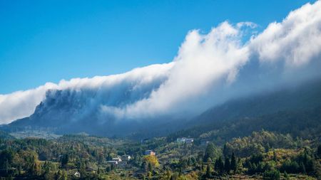 Ever seen clouds cascade over mountains like a waterfall? - CGTN