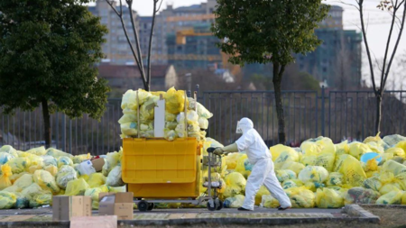 Medical waste handlers in Wuhan brave all to dispose infected waste - CGTN
