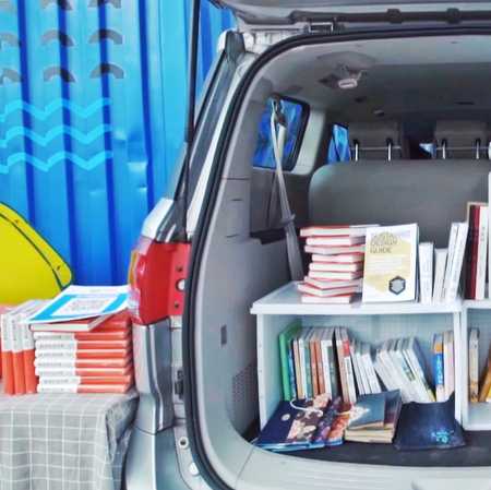Travel around China in a book car - CGTN