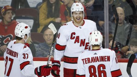 Canes end Flames' 7-game win streak; Isles top Sabres in OT - CGTN