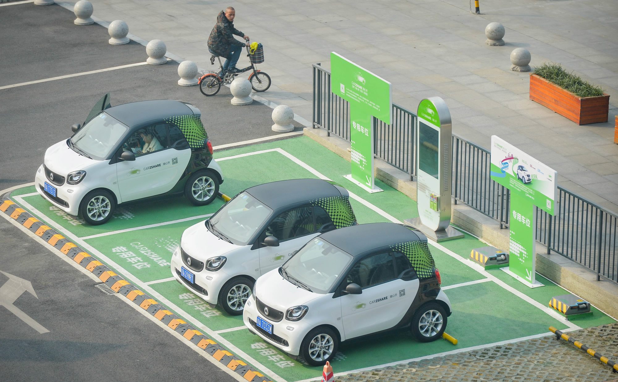 Scan and drive: Future bright for green car-share schemes - CGTN